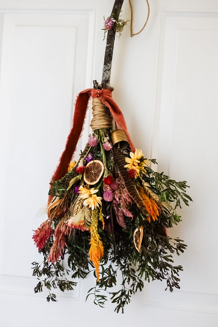 Blooming Broom Magic: A Floral Twist on a Classic Halloween Decoration ...